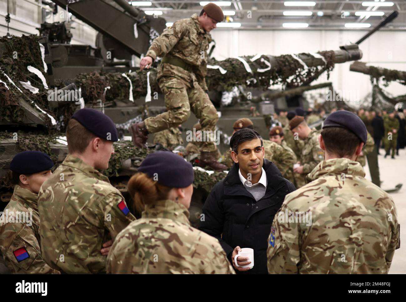 Prime Minister Rishi Sunak has a cup of tea with troops at the Tapa ...