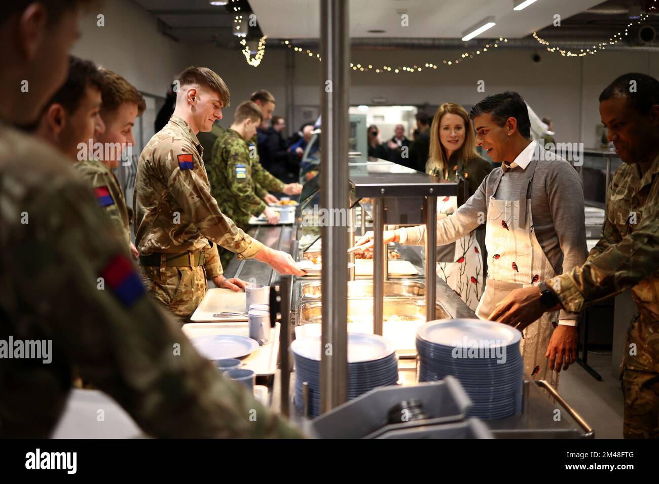 Prime Minister Rishi Sunak serves Christmas dinner to troops with ...