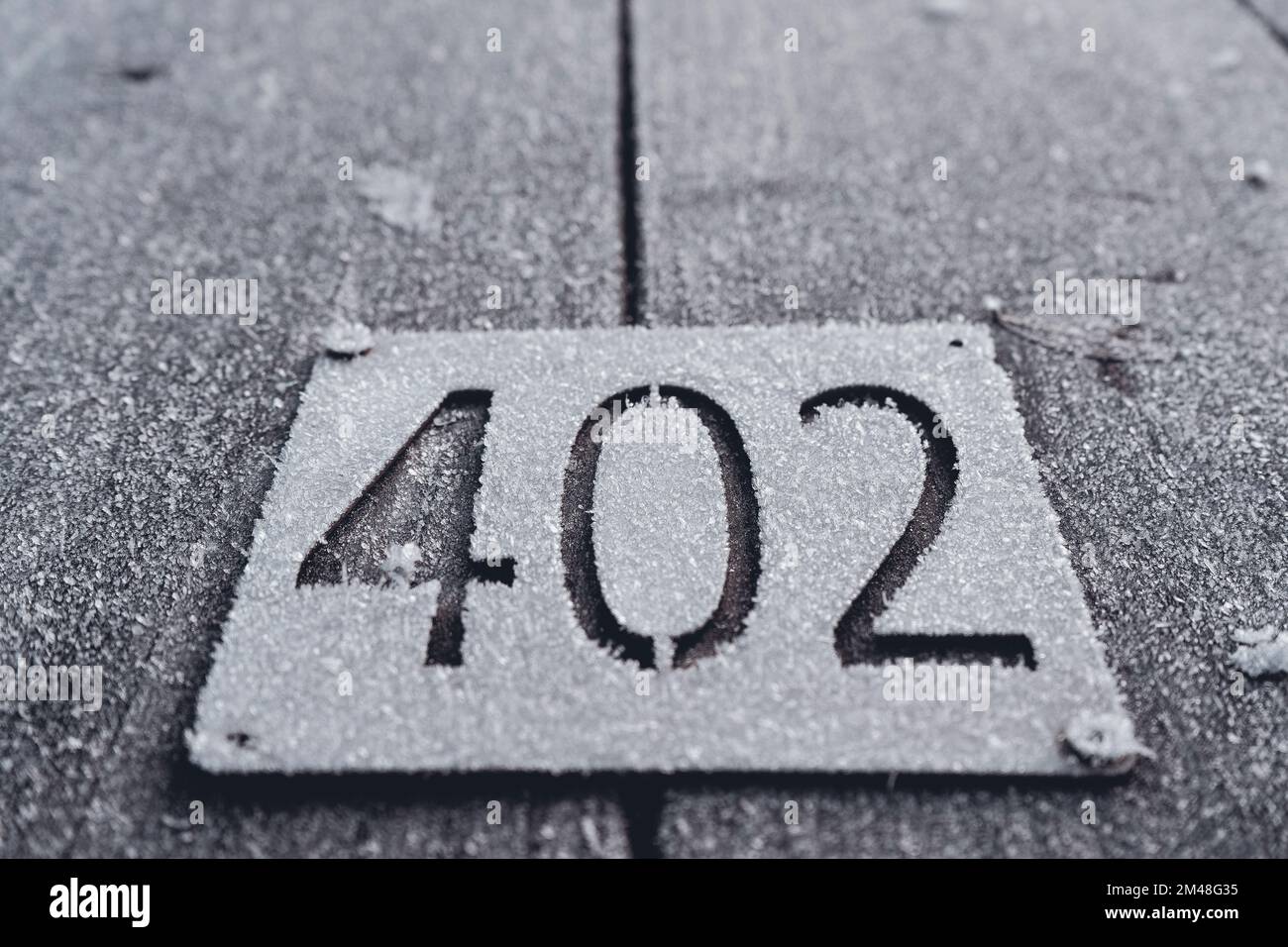 snow-covered numbers, cold landscape, number 402 Stock Photo - Alamy