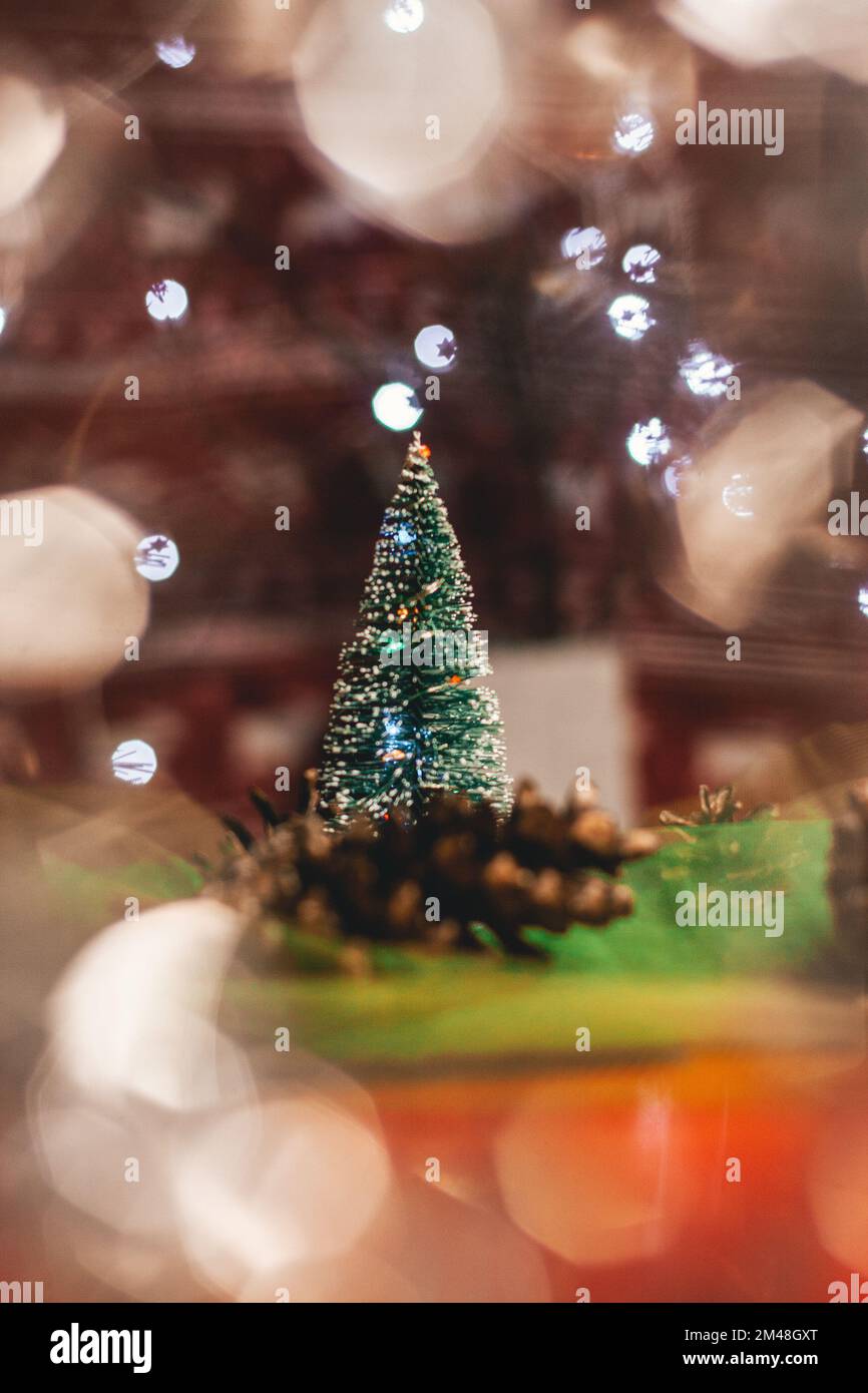 Christmas card with decorations. a green artificial Christmas tree with ...