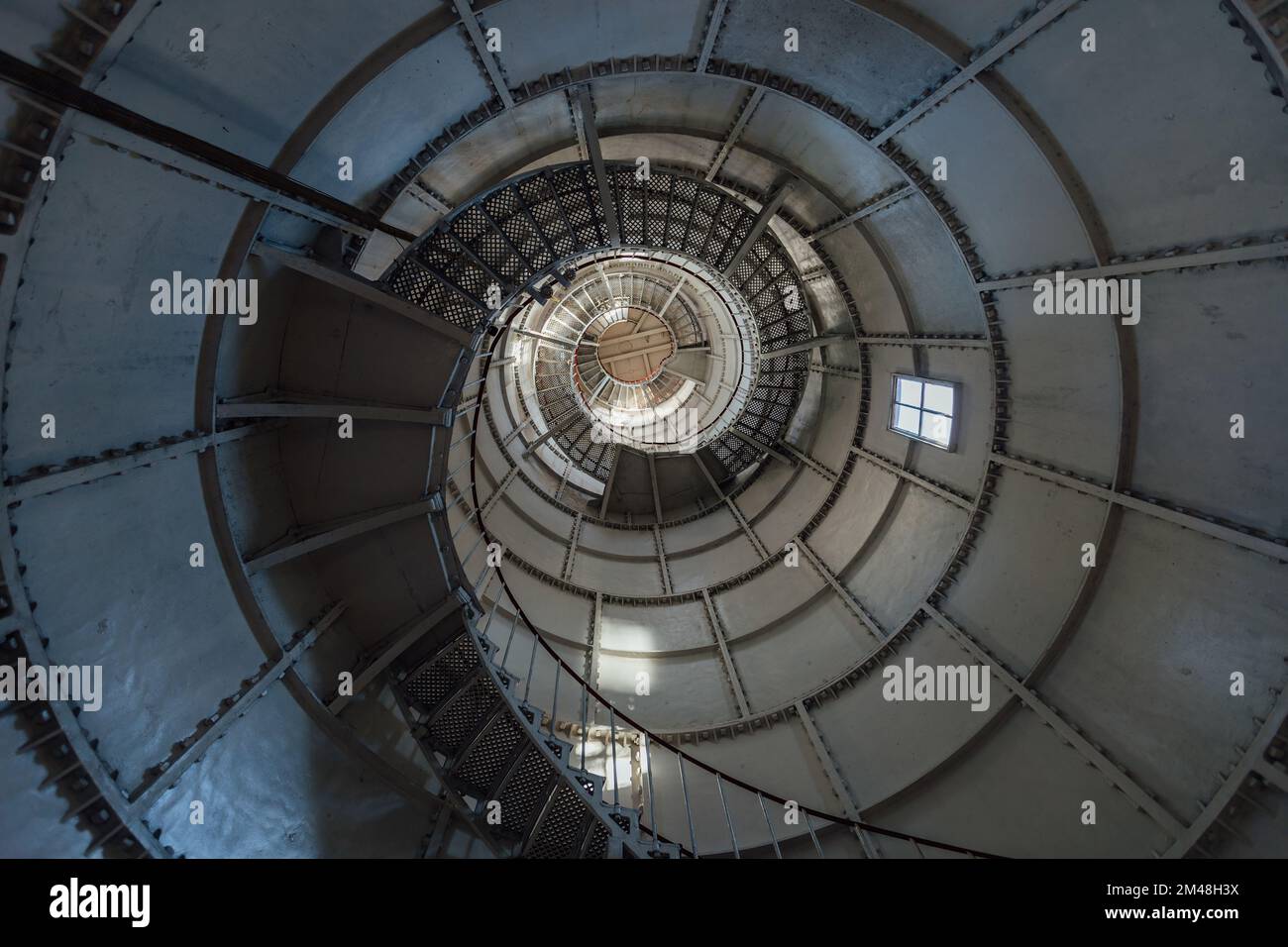 Iron spiral staircase inside the old lighthouse, bottom view Stock ...