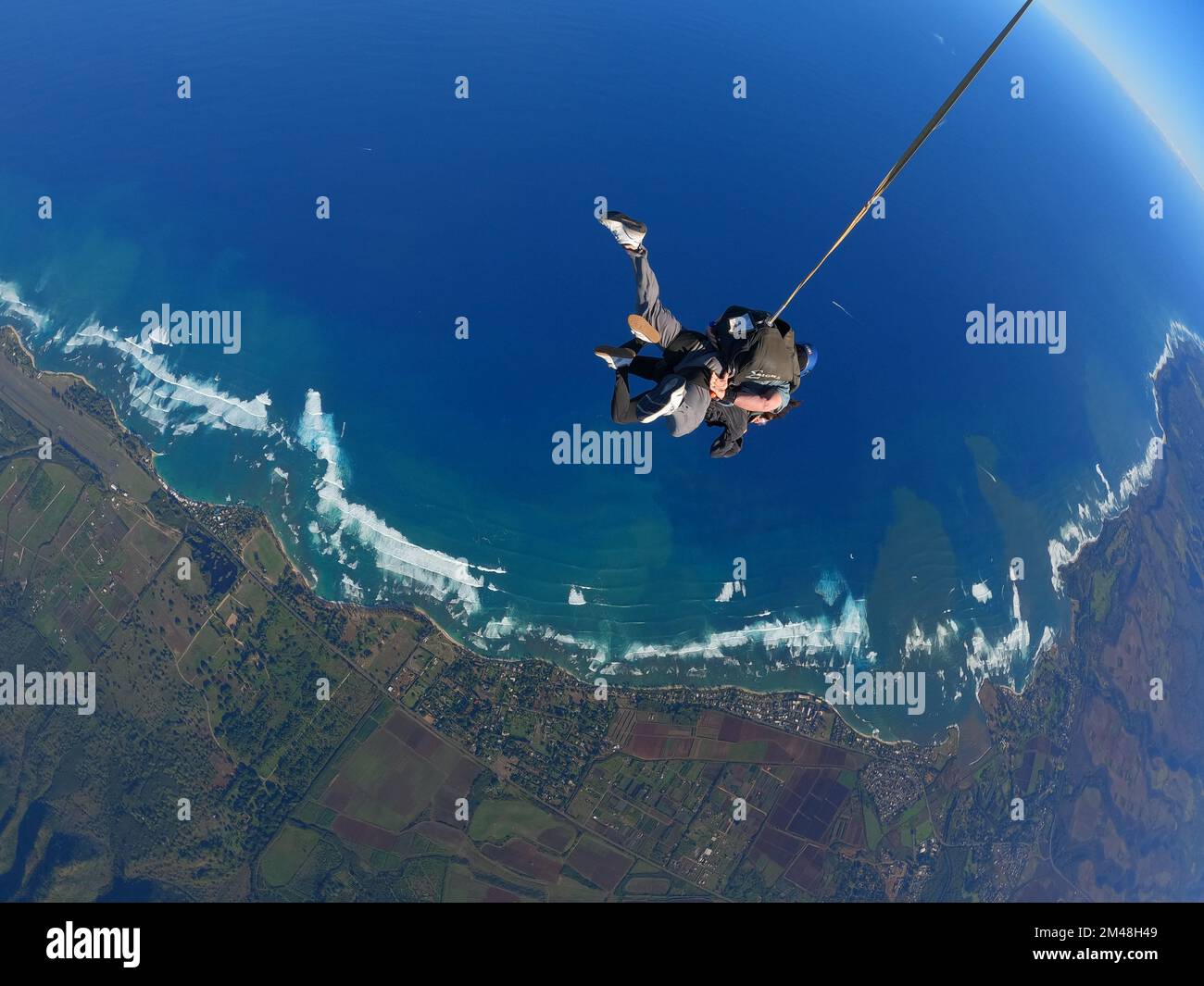 A skydiving above the ocean Stock Photo - Alamy