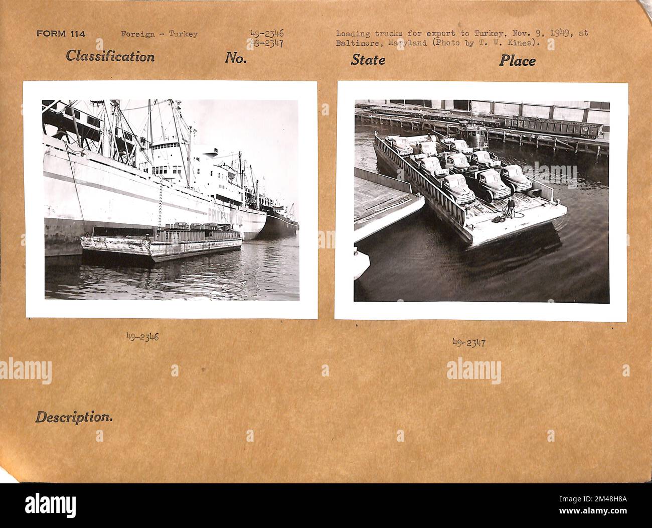 Loading trucks bound for Turkey in Baltimore. Original caption: Loading ...