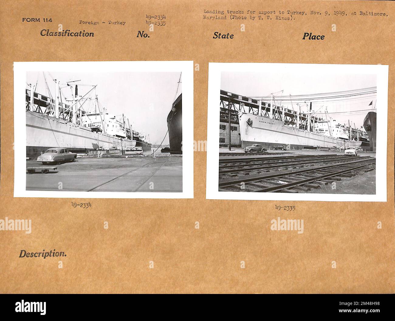 Loading trucks bound for Turkey in Baltimore. Original caption: Loading ...