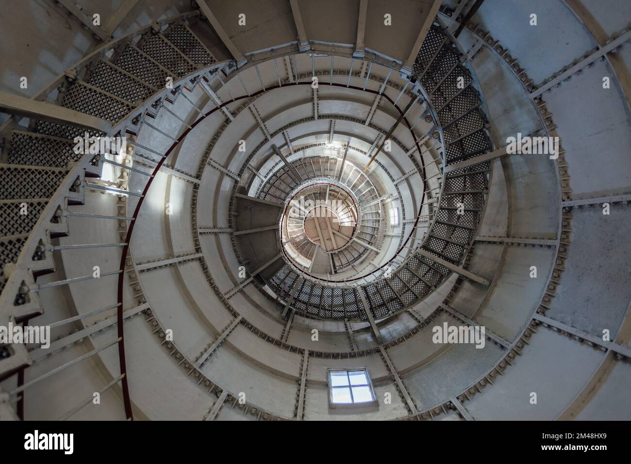 Iron spiral staircase inside the old lighthouse, bottom view Stock ...