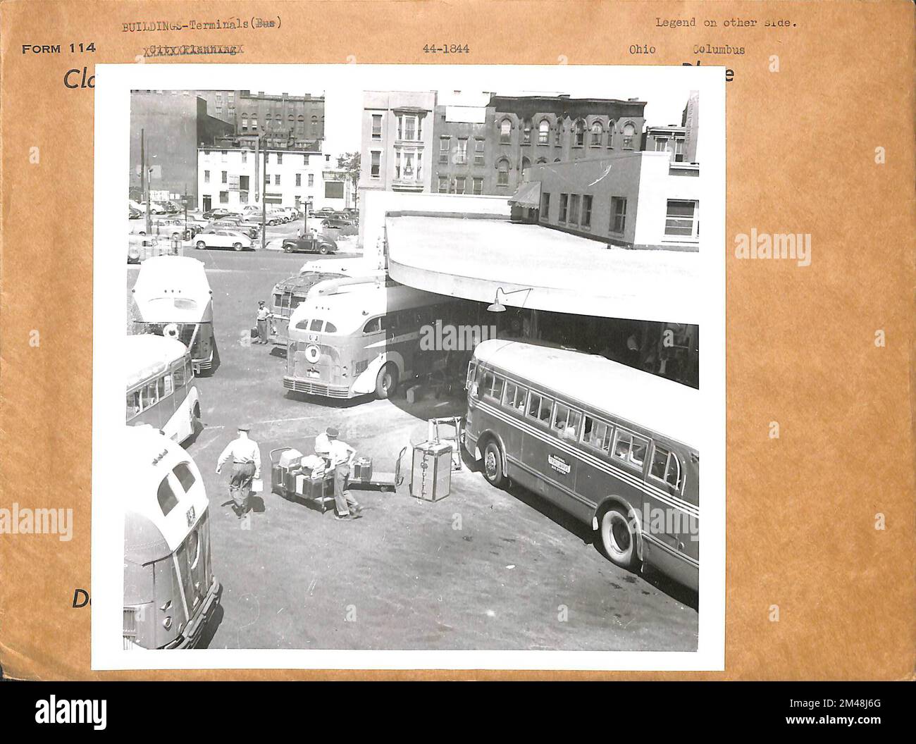 Busses Pull Up at the Greyhound Station. Original caption: Columbus ...