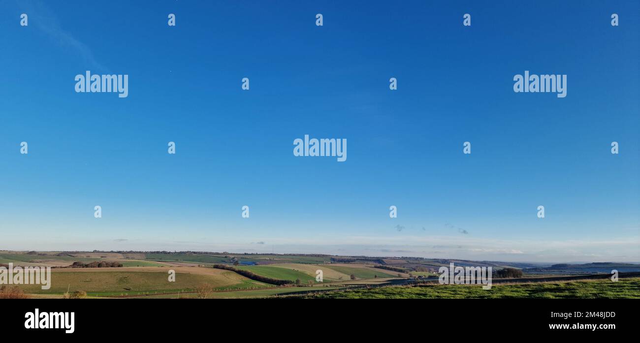 Panoramic view of the plains against the blue sky Stock Photo - Alamy