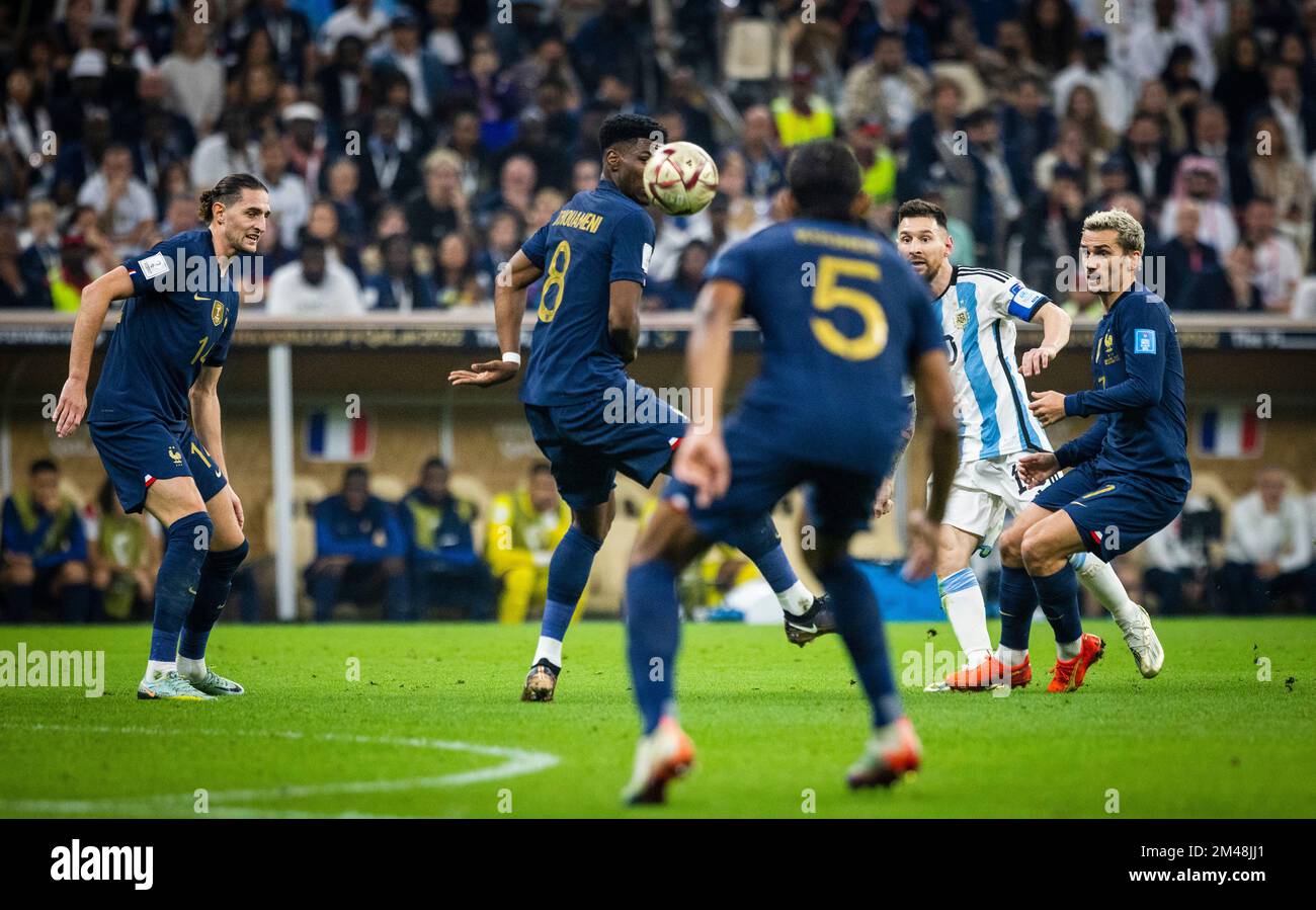 Doha, Qatar. 18th Dec, 2022. Lionel Messi (Arg), Adrien Rabiot (FRA ...