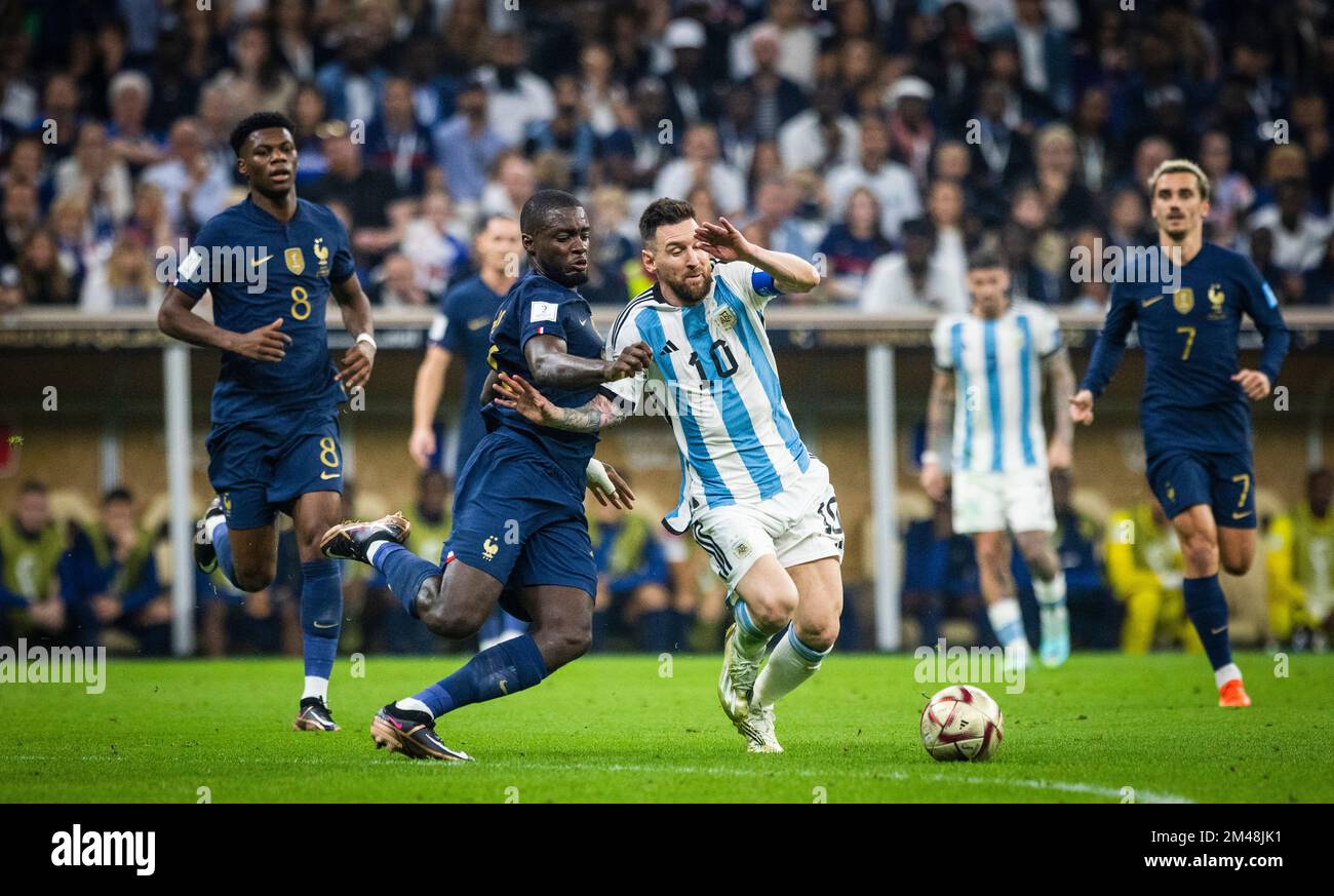 Doha, Qatar. 18th Dec, 2022. Dayot Upamecano (FRA), Lionel Messi (Arg ...