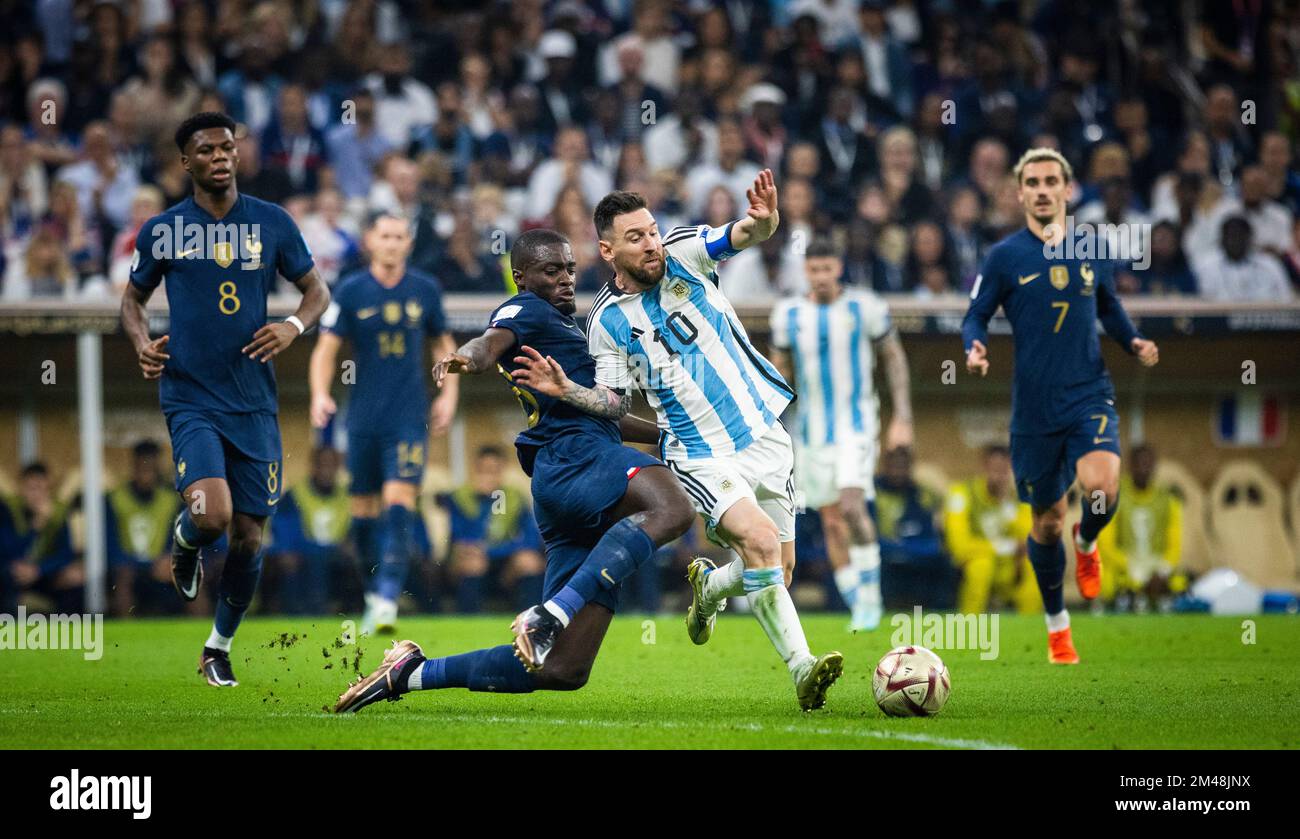 Doha, Qatar. 18th Dec, 2022. Dayot Upamecano (FRA), Lionel Messi (Arg ...