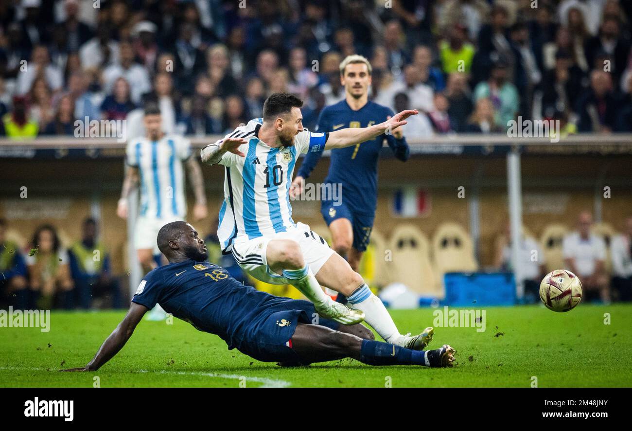 Doha, Qatar. 18th Dec, 2022. Dayot Upamecano (FRA), Lionel Messi (Arg ...