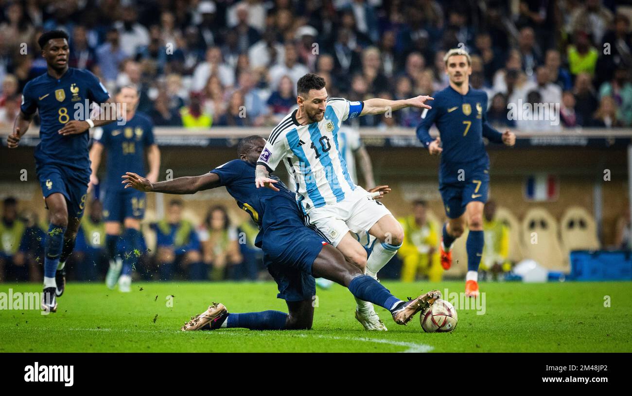 Doha, Qatar. 18th Dec, 2022. Dayot Upamecano (FRA), Lionel Messi (Arg ...