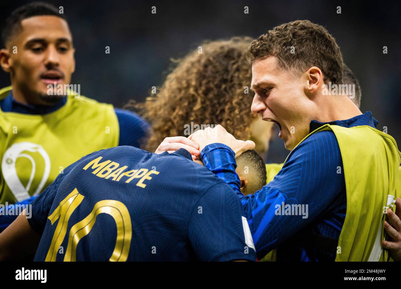 Doha, Qatar. 18th Dec, 2022. Benjamin Pavard (FRA), Kylian Mbappe (FRA ...