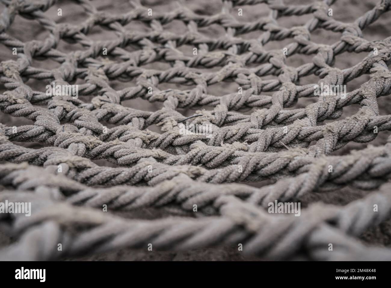 Children swing rope network pattern Stock Photo - Alamy