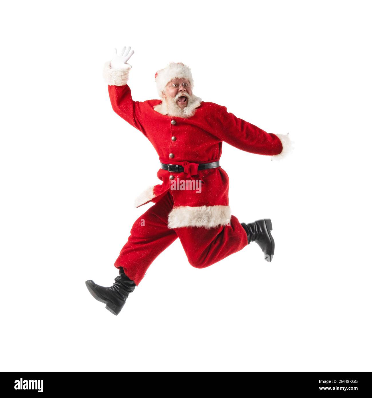 Santa Claus jumping with hands lifted upwards isolated on white ...