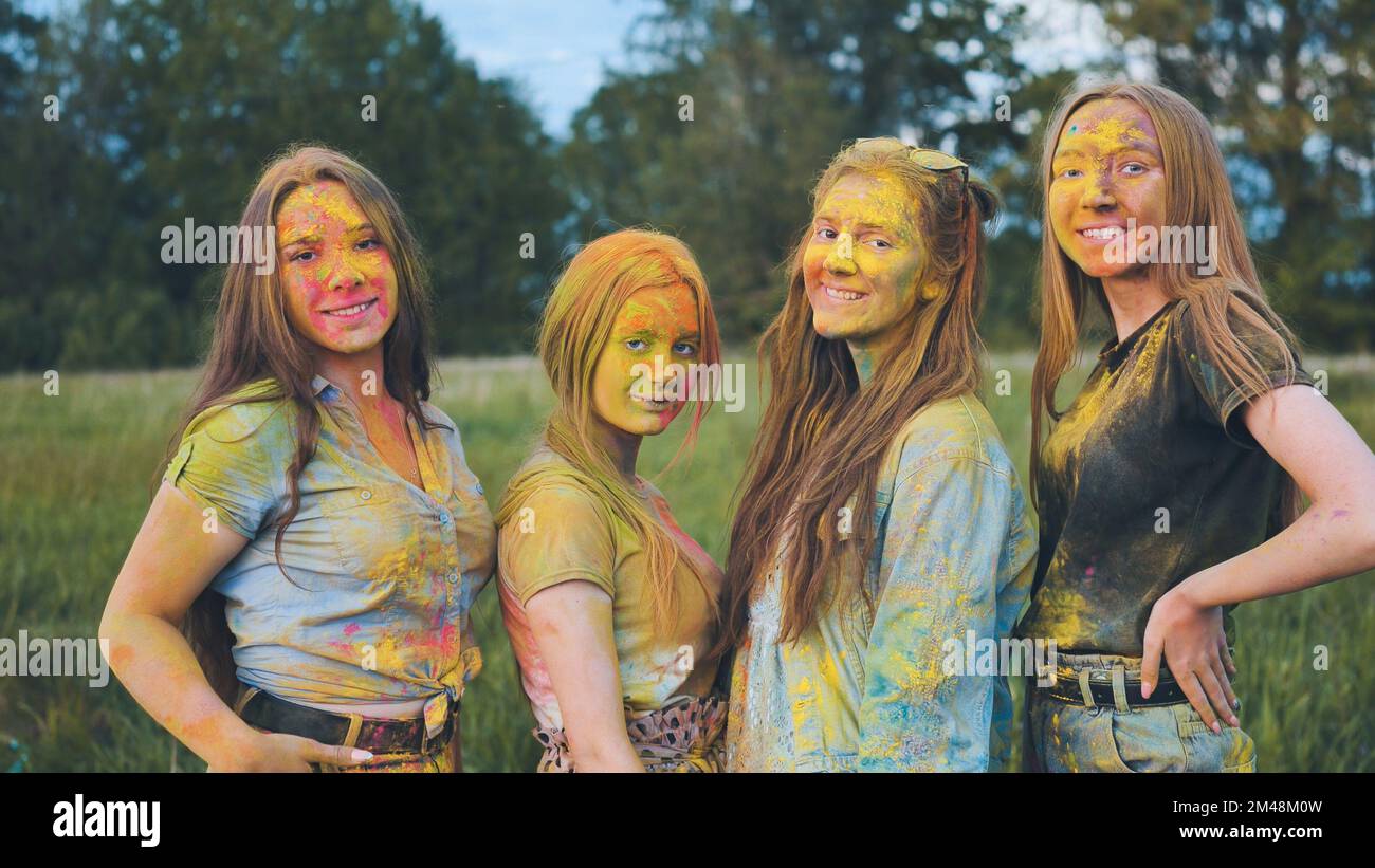 Indian woman smeared with bright holi colors hi-res stock photography ...