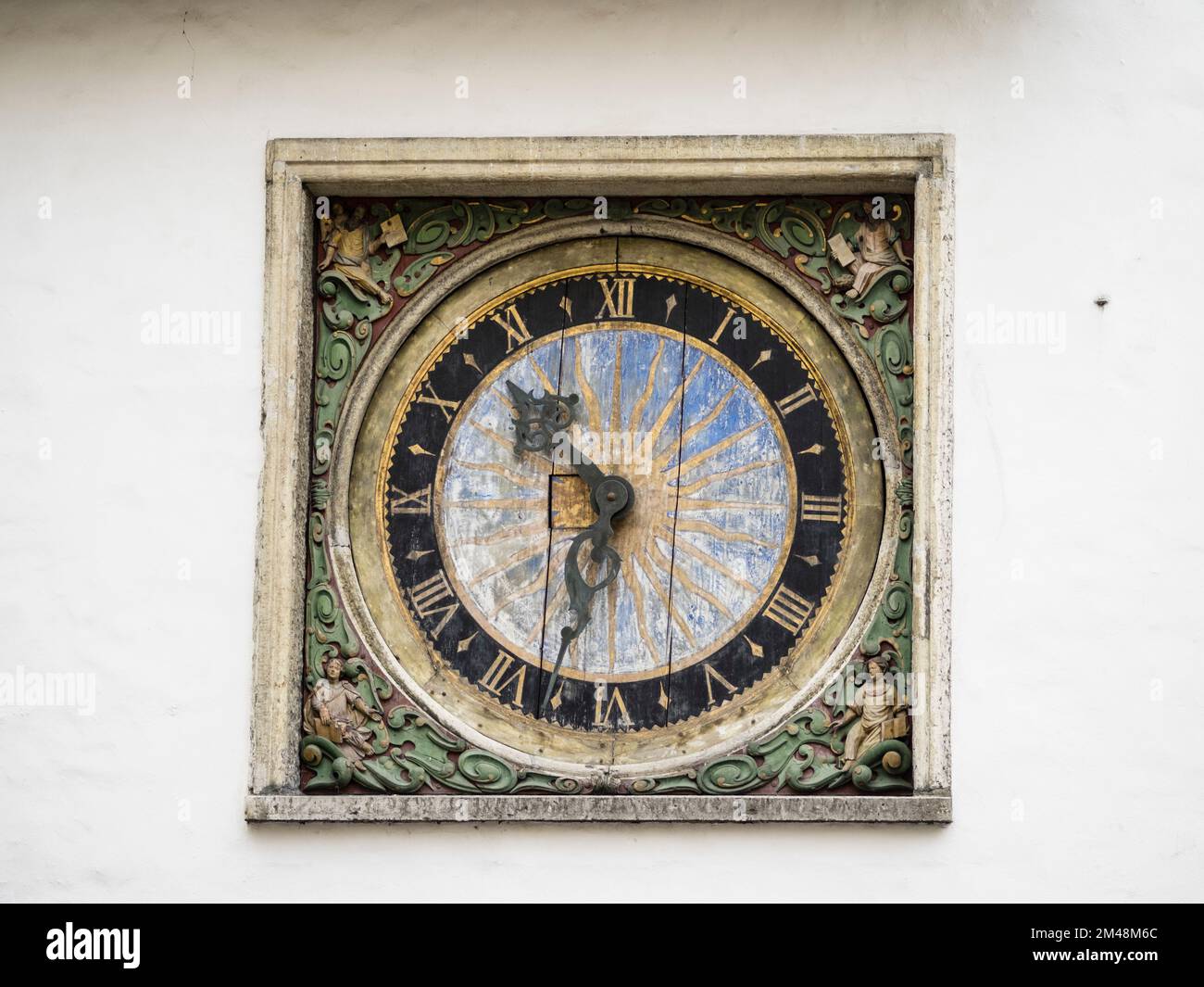 Old carved clock outside Church of the Holy Spirit, Old Town, Tallinn ...