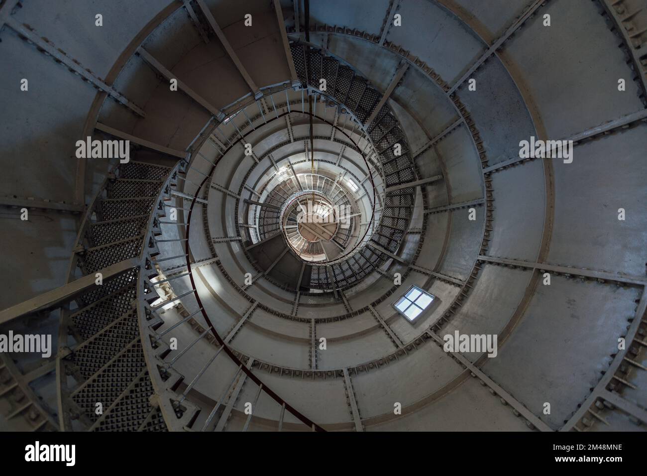 Iron spiral staircase inside the old lighthouse, bottom view Stock ...