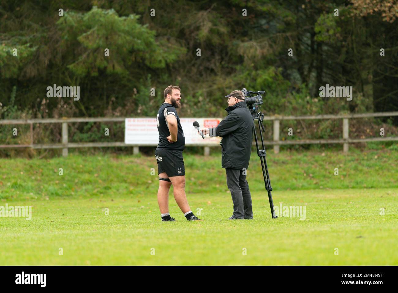 Television reporter interviews Berwick captain on camera after the ...