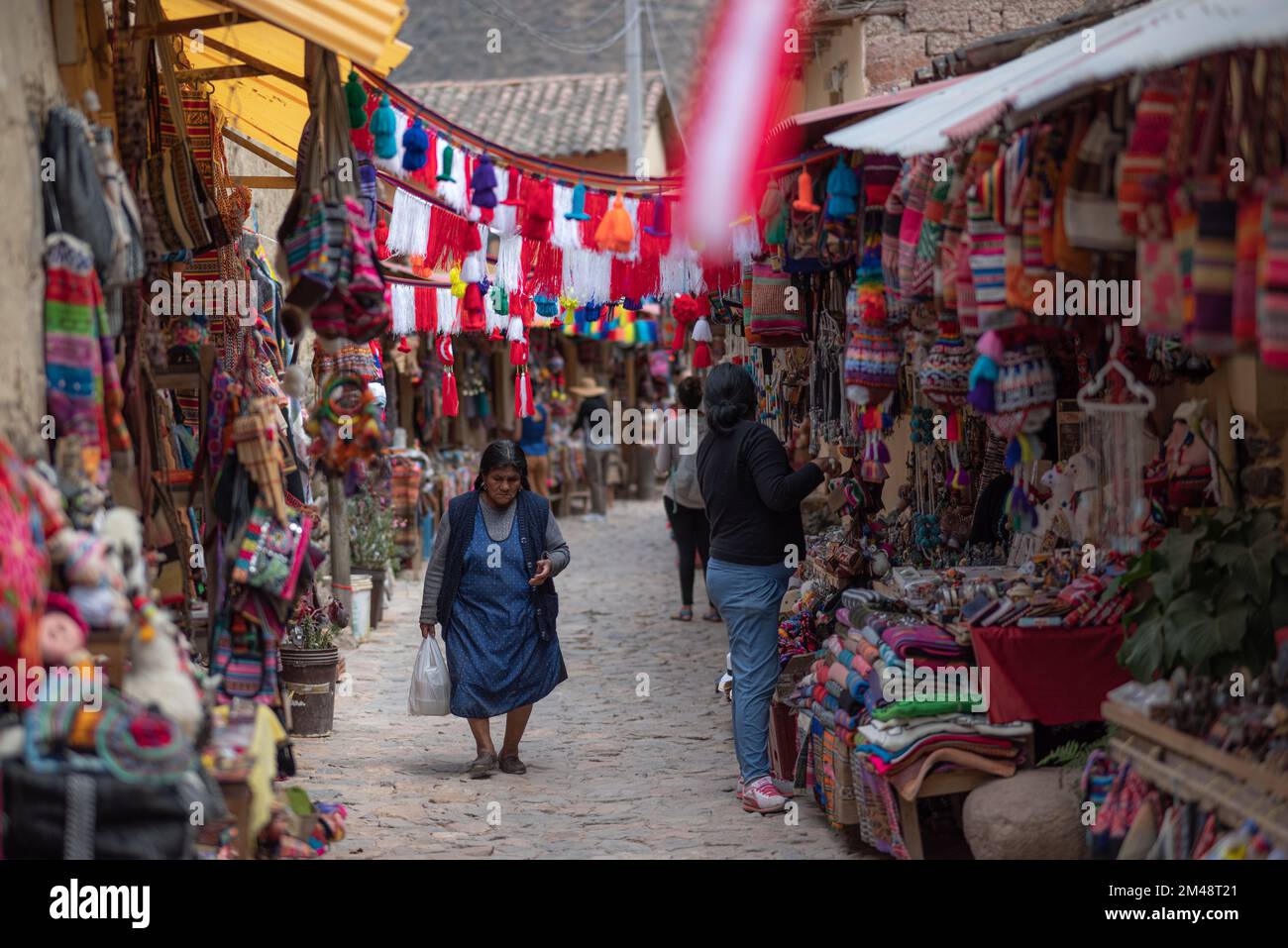 Shops in a traditional market in Downtown Cusco, Peru with colorful ...
