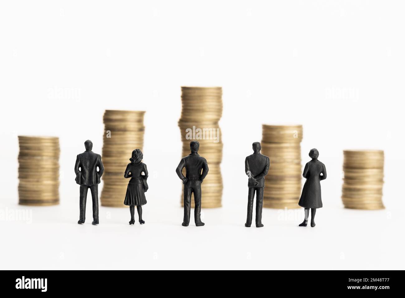 Money stack figurines hi-res stock photography and images - Alamy