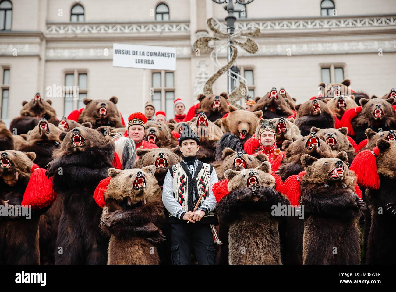 A group of people wearing bear costumes for the traditional Romanian ...