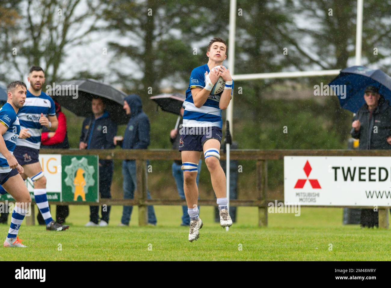 Howe of Fife player catches ball while jumping in the air, with ...