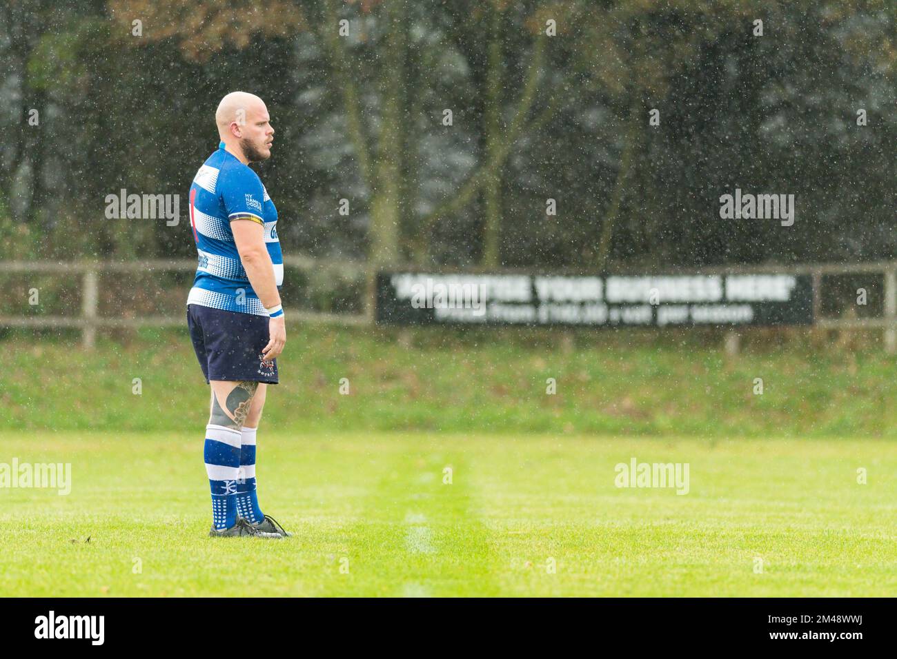 Howe of Fife player looks from left to right standing in the rain ahead ...