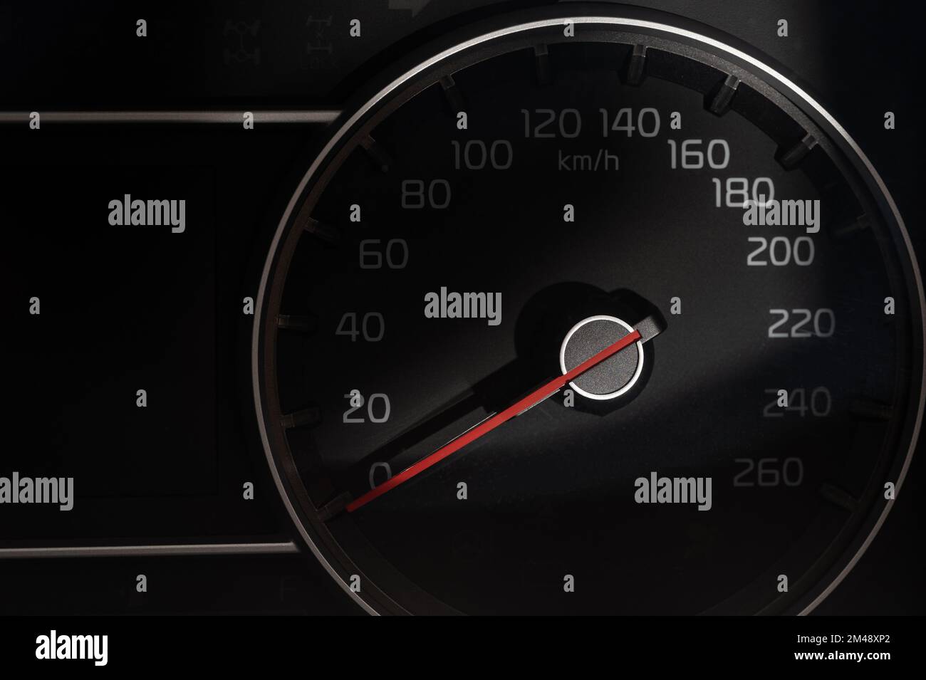 Car speed meter gauge on dark background close up view Stock Photo - Alamy