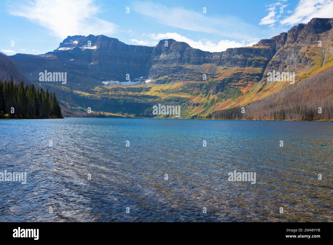 Cameron Lake, in a glacial cirque, and Mount Custer. The lake crosses ...