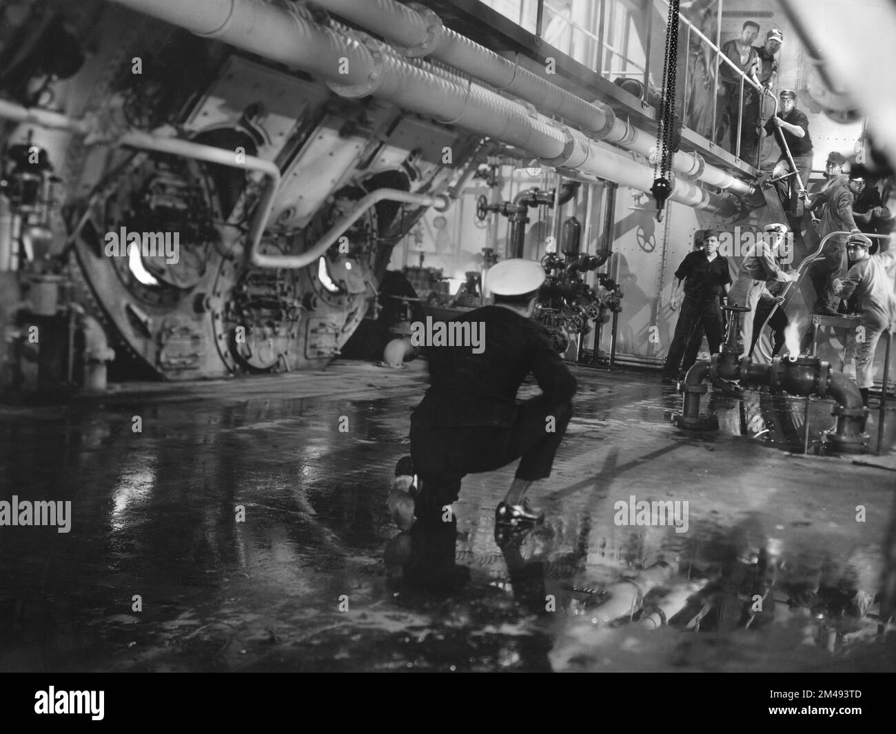 Harry Woods (rear-view, kneeling), on-set of the Film, "Dante's Inferno ...