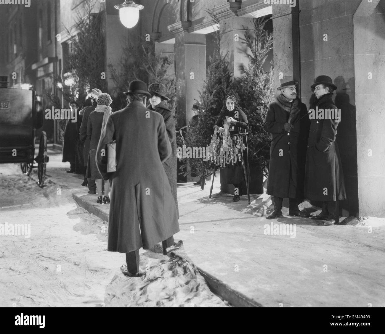 Norma Shearer (selling dolls), on-set of the Silent Film, "The Devil's Circus", MGM, 1926 Stock ...