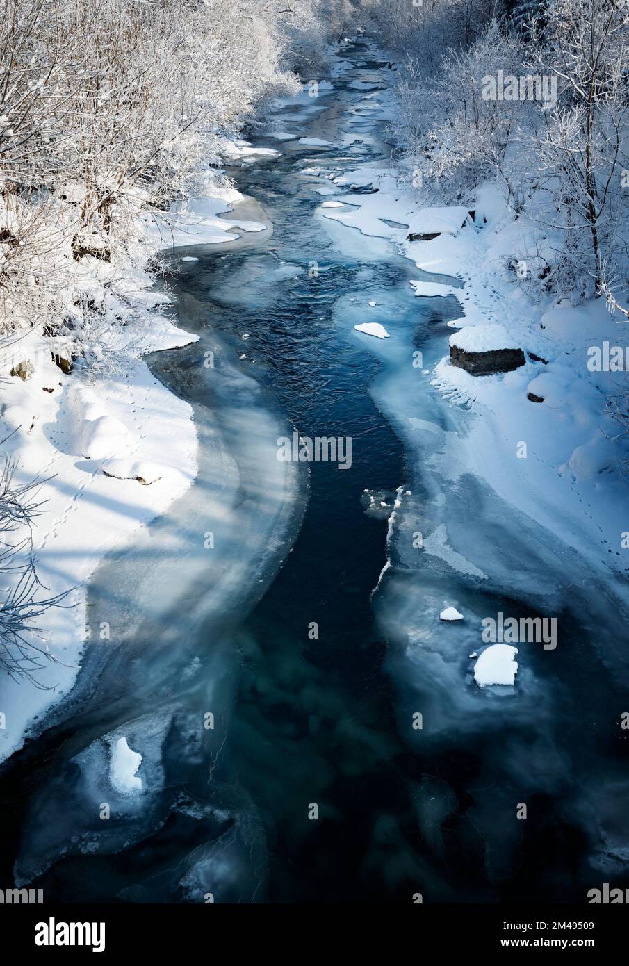 seasonal background winter frozen wavy river Stock Photo - Alamy