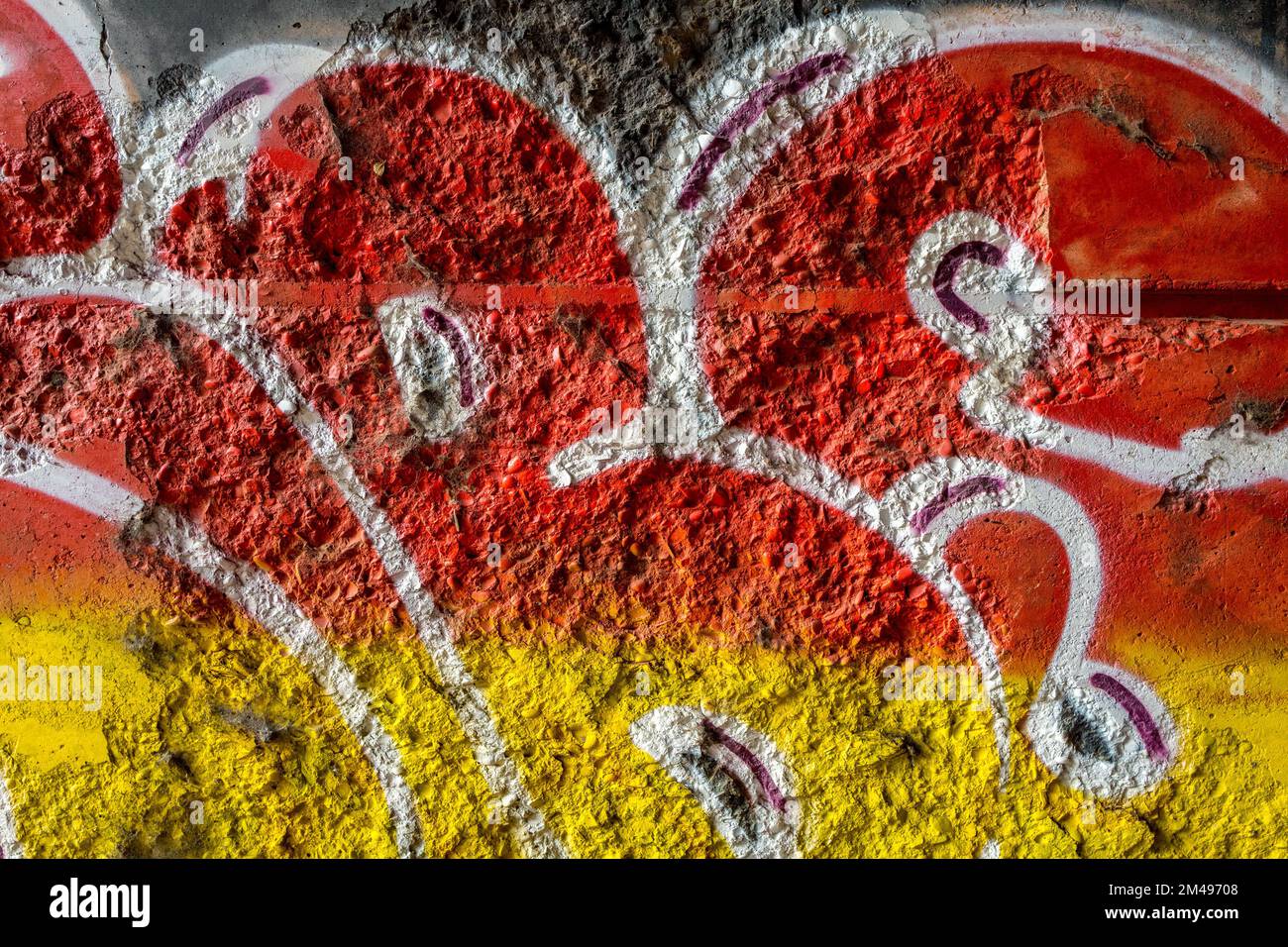 Wall graffiti and fly tipping inside an abandoned road tunnel Stock ...