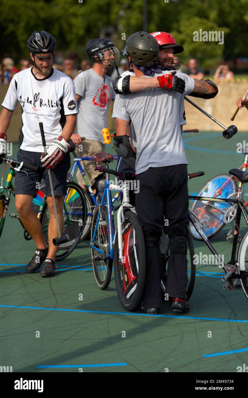 bicycle polo team celebrate a win Stock Photo - Alamy