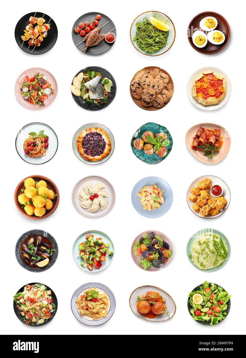 Collection of plates with tasty dishes on white background Stock Photo ...