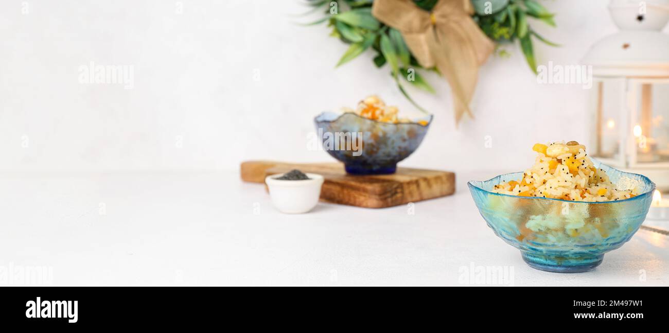 Bowl of traditional Christmas kutya dish on light background with space ...
