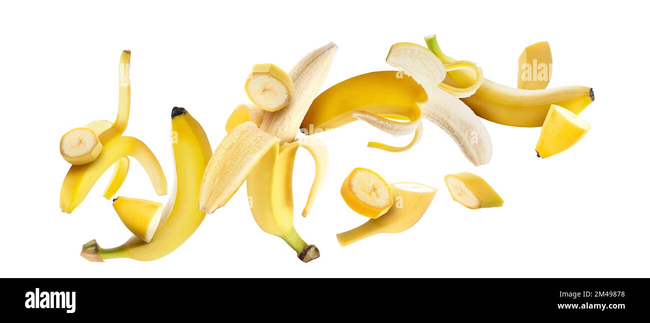 Flying fresh ripe bananas on white background Stock Photo - Alamy