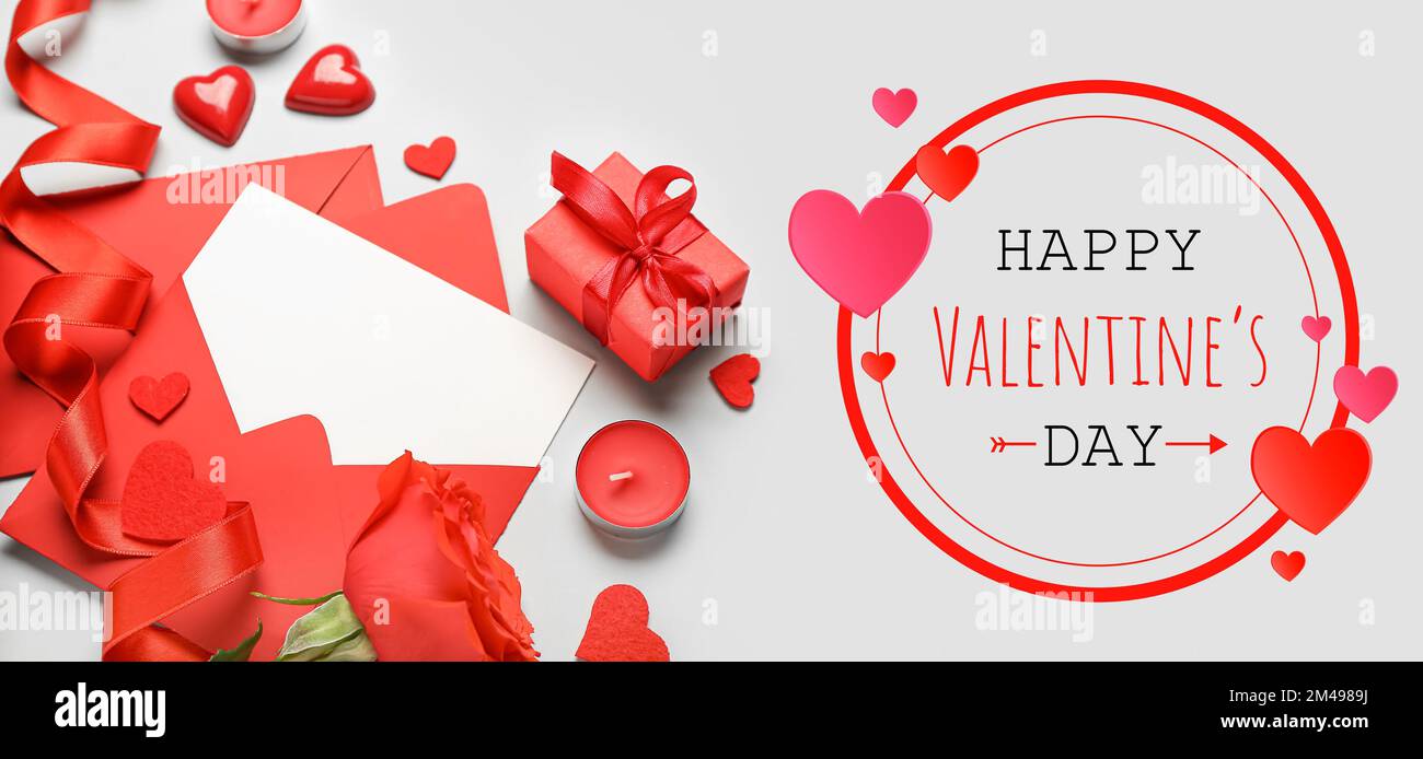 Envelopes, gift, candle and rose on light background. Valentine's Day ...