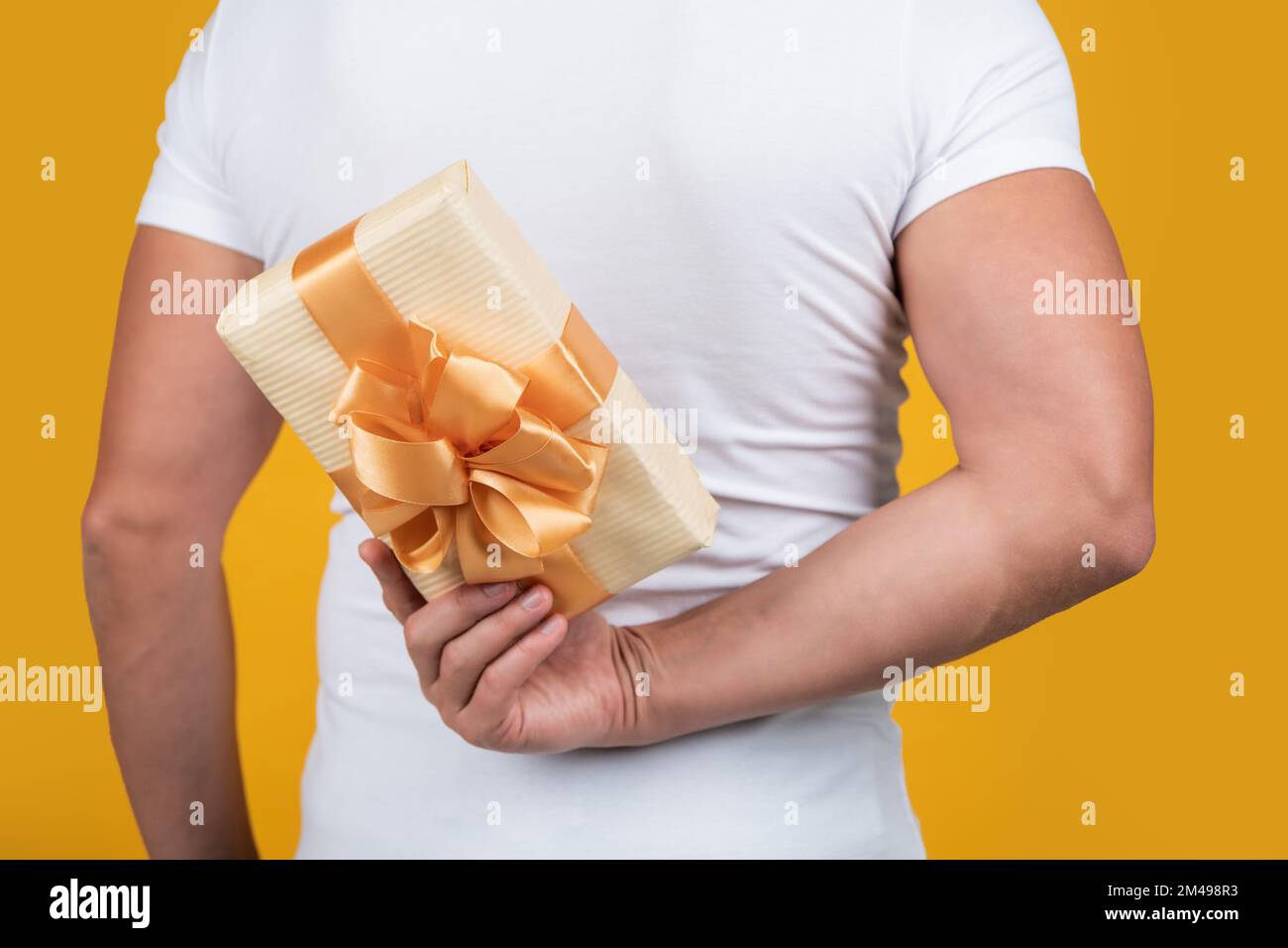closeup photo of man holding occasion present box. man hold present box ...