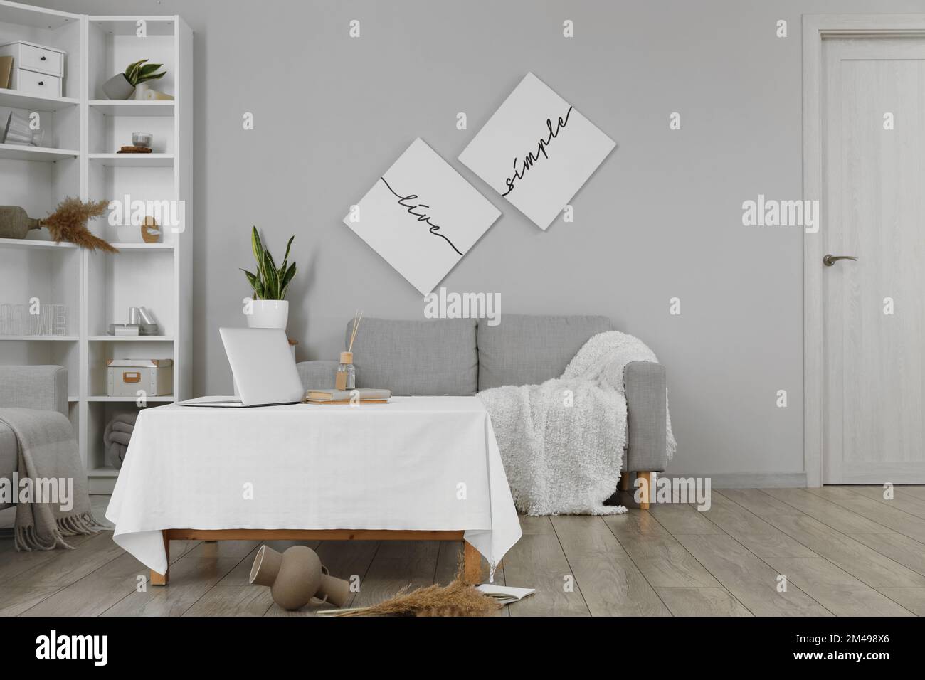 Interior of messy living room Stock Photo - Alamy