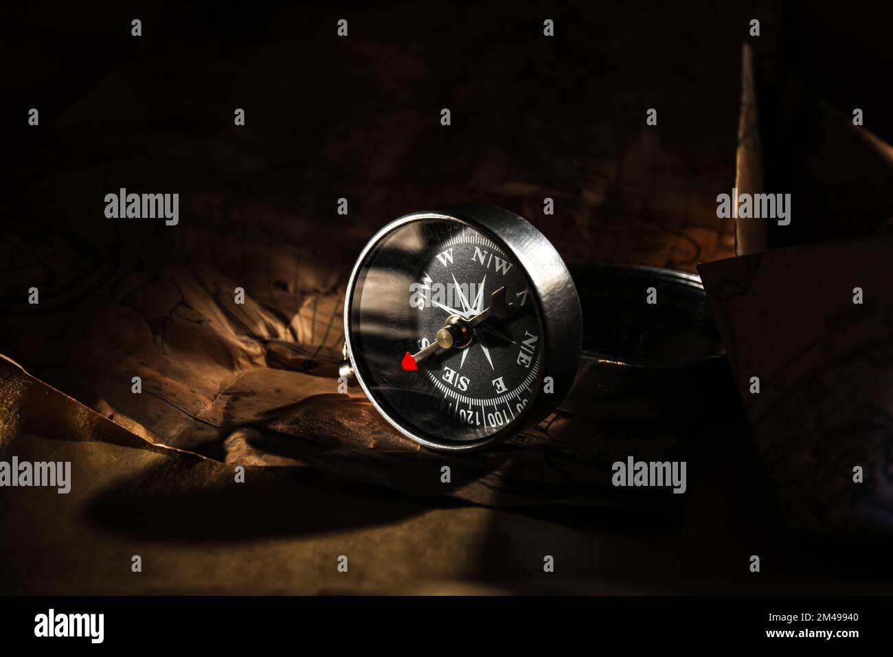 Black compass on world map Stock Photo - Alamy