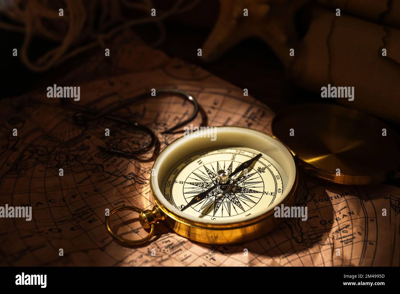 Old hooks on black background hi-res stock photography and images - Alamy