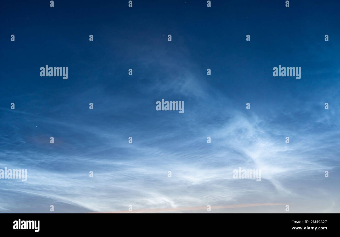 Silver clouds in the sky of night Karelia. Russia. They are the highest ...