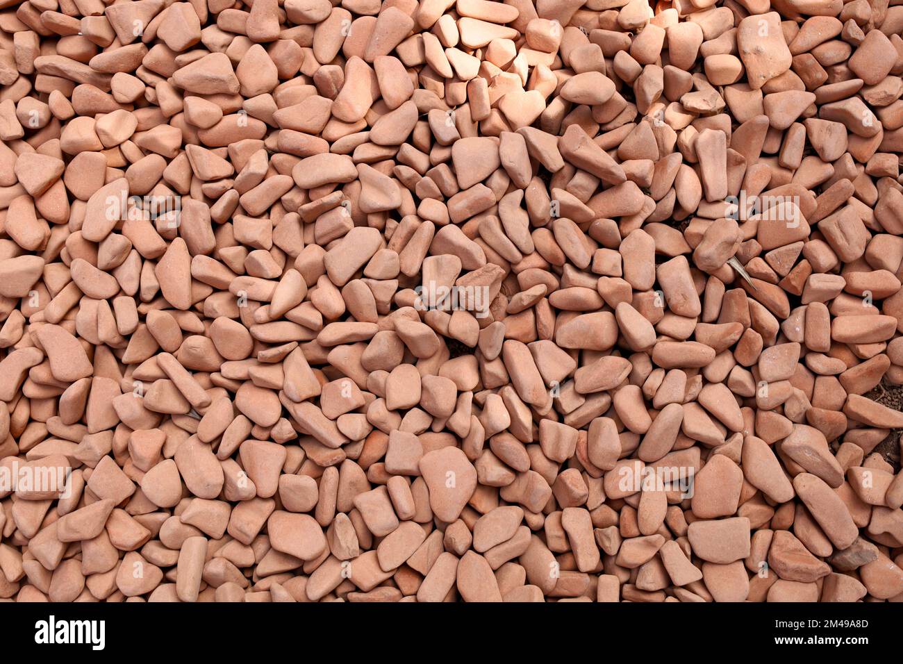 Brown sea pebbles as background Stock Photo - Alamy