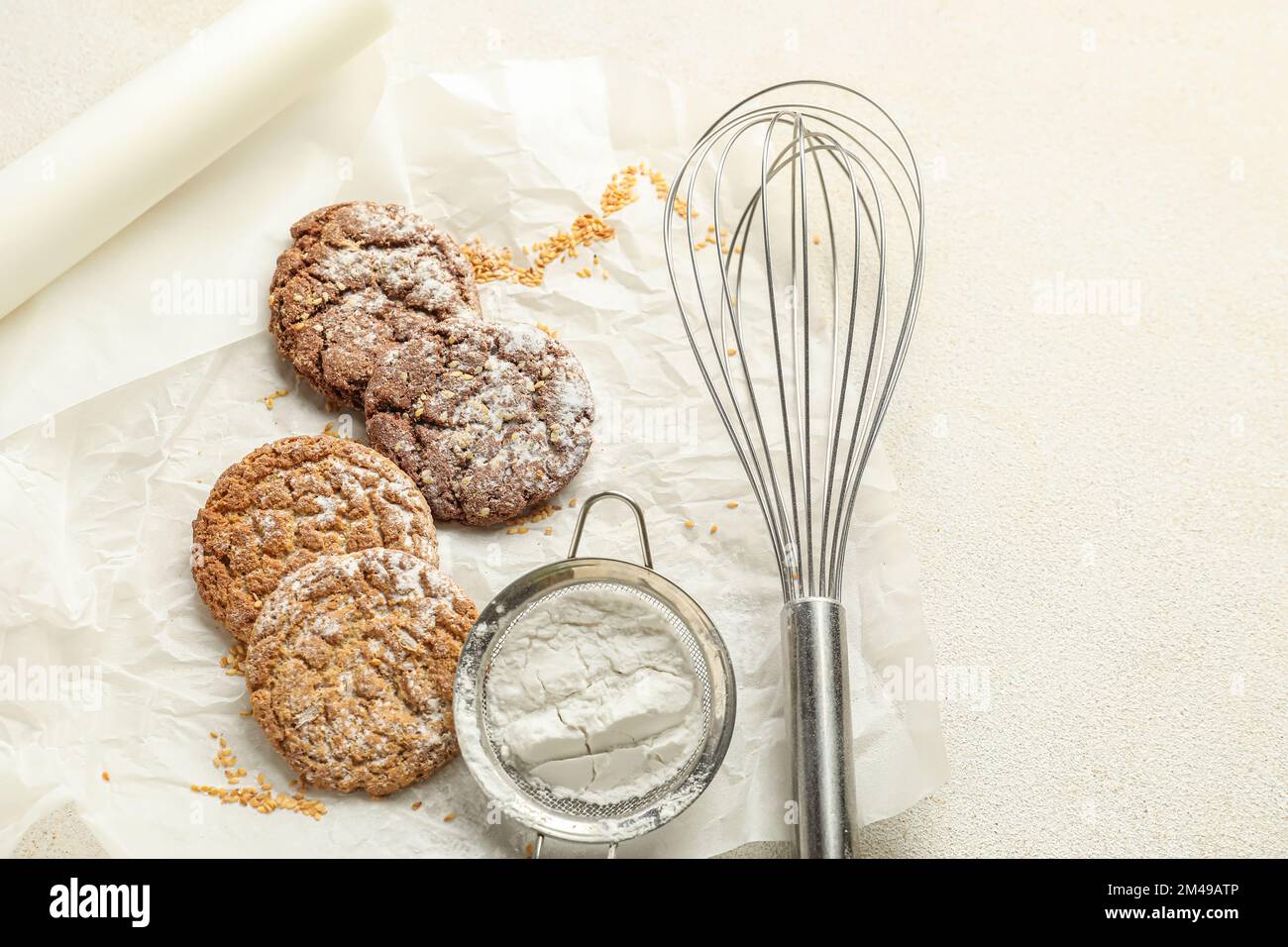 Baking paper with delicious cookies on light background, closeup Stock ...