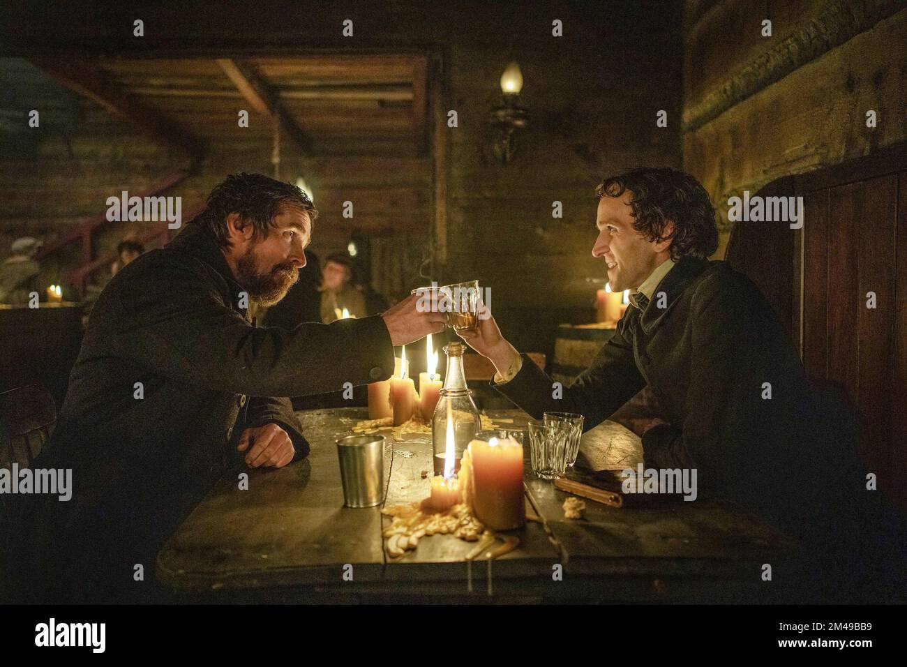 THE PALE BLUE EYE, from left: Christian Bale, Harry Melling as Edgar ...