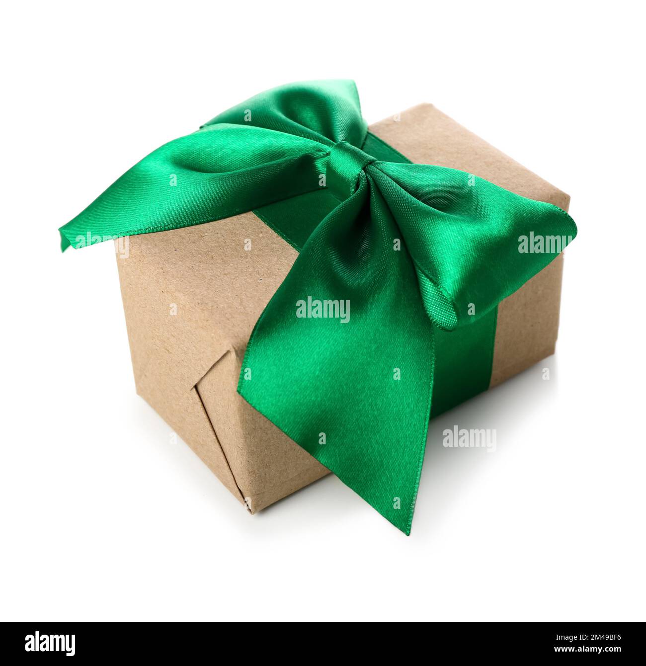 Gift box with beautiful bow made of green ribbon on white background ...