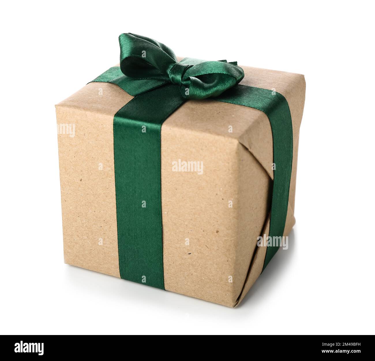 Gift box tied with green ribbon on white background Stock Photo - Alamy