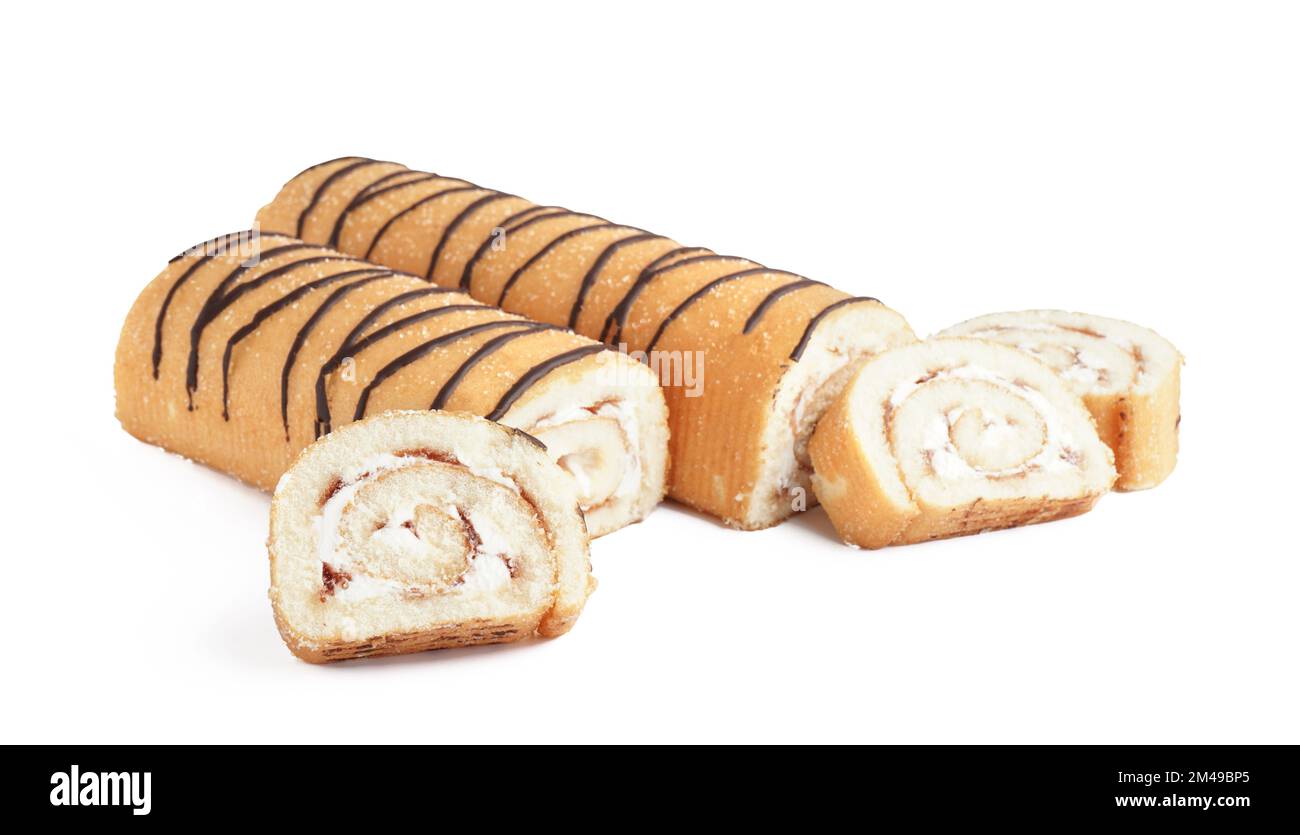 Cut sponge cake rolls on white background Stock Photo - Alamy